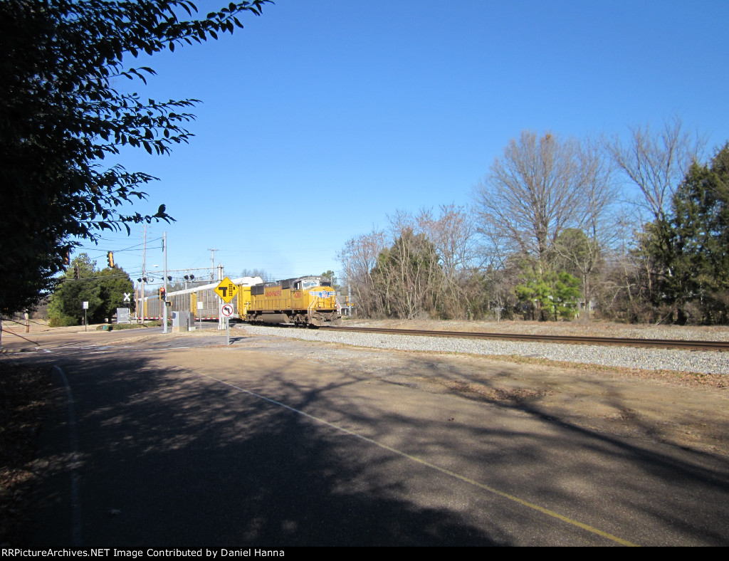 UP 4288 heads east with 75 empty autoracks